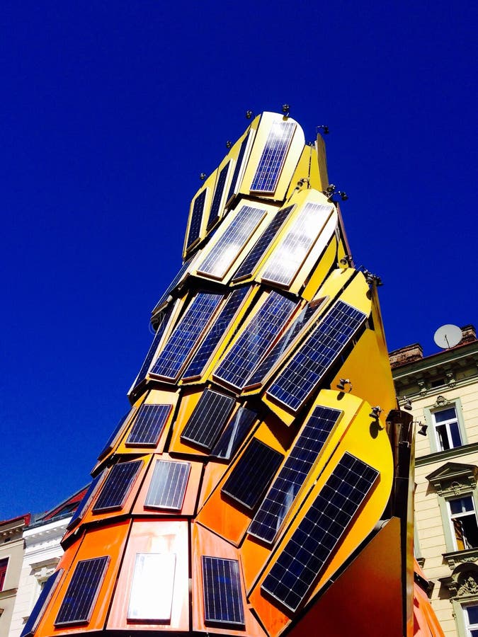 Sculpture and solar panels stock photo. Image of form - 54382728