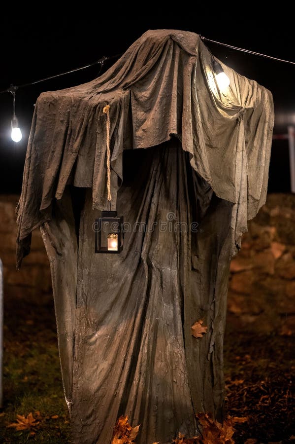 Sculpture of a Spooky Ghost Figure Suspended from a Clothesline Stock ...