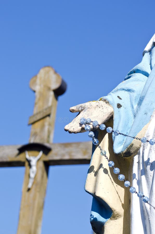 Sculpture of St. Mary Hand and Blur Cross Stock Image - Image of ...