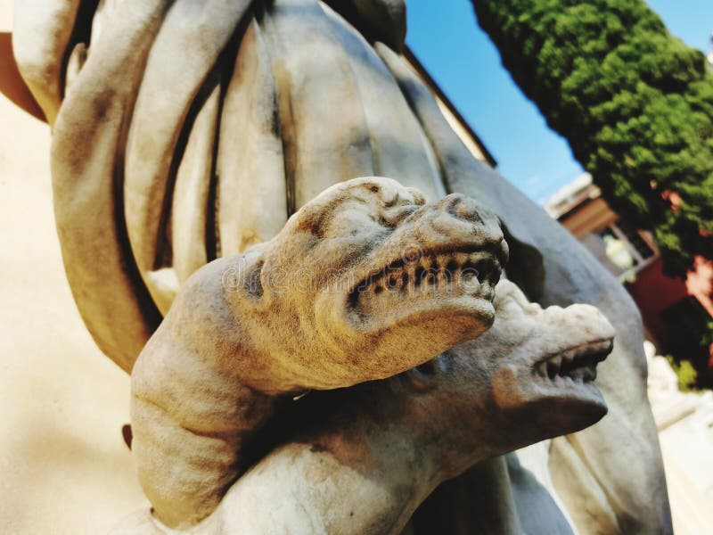 Close-up of Two Snakes Swirled Around a Winged Baton Stock Image ...