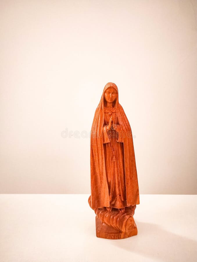 Sculpture of the Virgin Mary with a Light Background Stock Photo ...