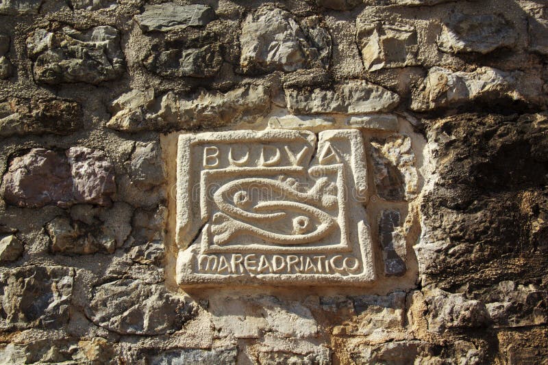 Sculpture on the Wall, Two Fish - a Symbol of Budva in Montenegro Stock ...