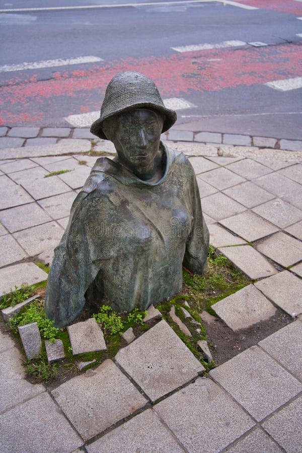 Sculpture of Woman Emerging from the Earth. Editorial Stock Image ...