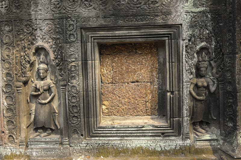 Sculptures at Angkor Wat stock photo. Image of famous - 37864918