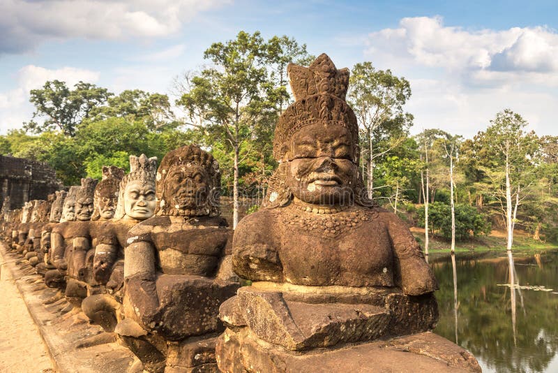 Sculptures in the Gate of Angkor Wat Stock Photo - Image of bayon, face ...