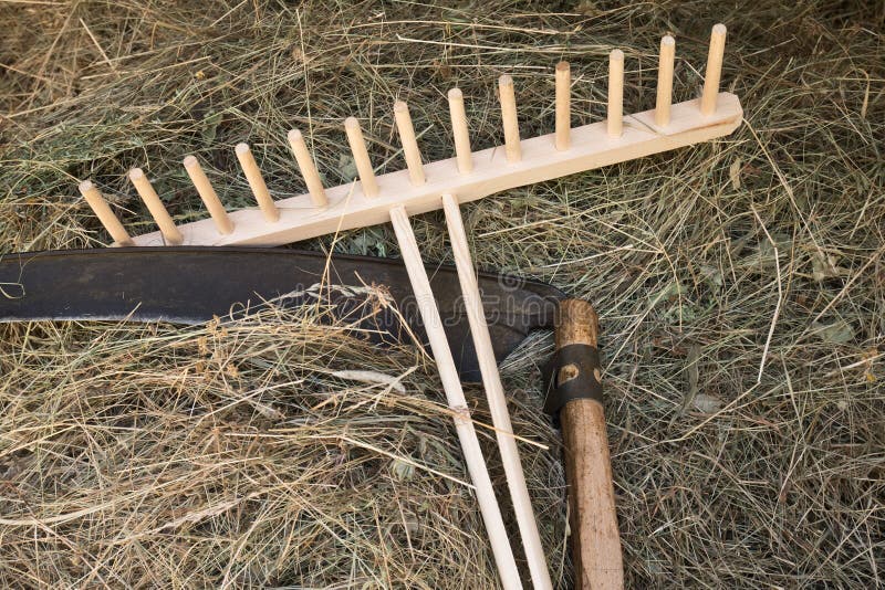 A scythe and a rake stock image. Image of grass, ancient - 123727527