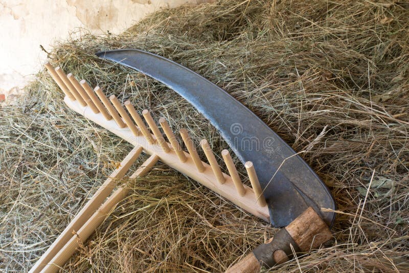 A scythe and a rake stock photo. Image of harvest, grass - 122017258