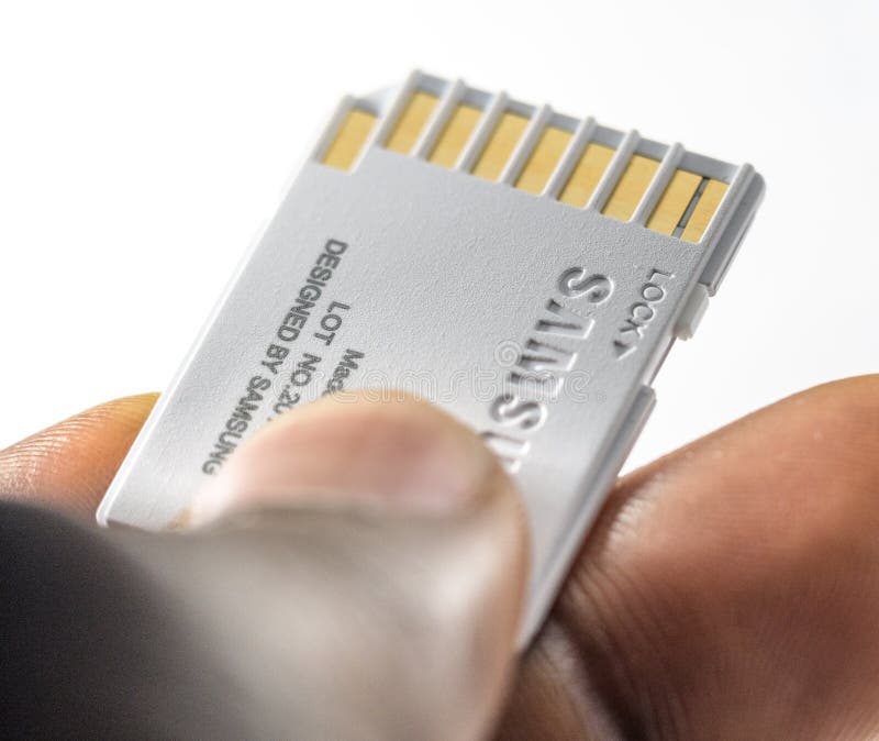 SD card on finger tip editorial image. Image of exposed - 108851605