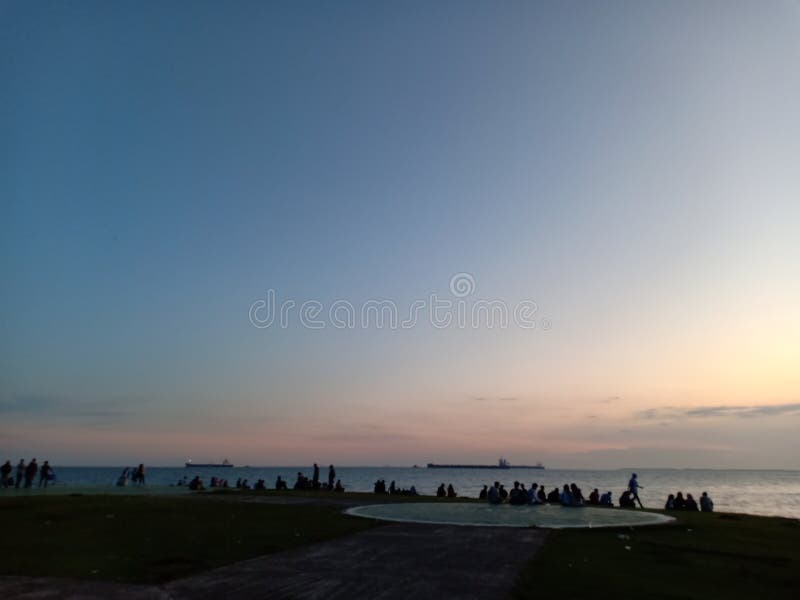 Sea Afternoon Moon Sky People Stock Image - Image of people, moon ...