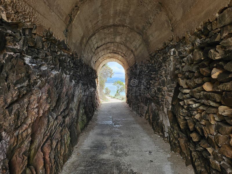 Sea Arch Stone Tunnel Overlooking the Sea or Ocean Stock Image - Image ...