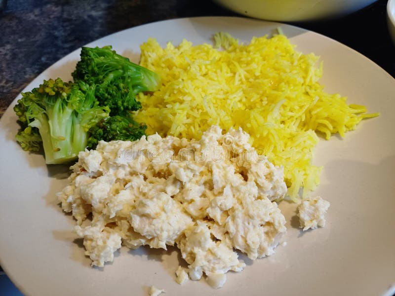 Sea Basa Fillet Pasteurized with Broccoli and Indien Yellow Rice Stock ...