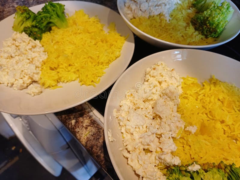 Sea Basa Fillet Pasteurized with Broccoli and Indien Yellow Rice Stock ...