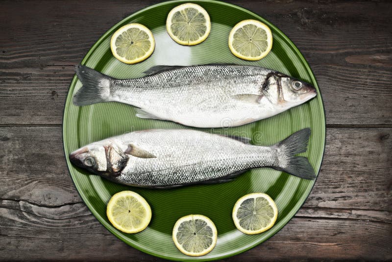 Fish Covered Microplastic on a Pink Plate. Impact of Micro Plastic on ...