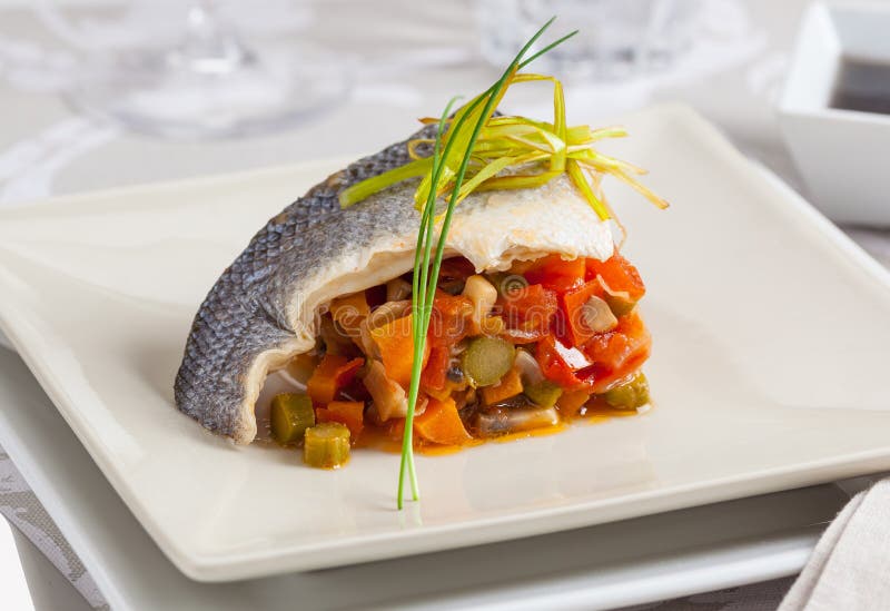 Sea bass dish stock image. Image of vegetables, recipe - 73590147
