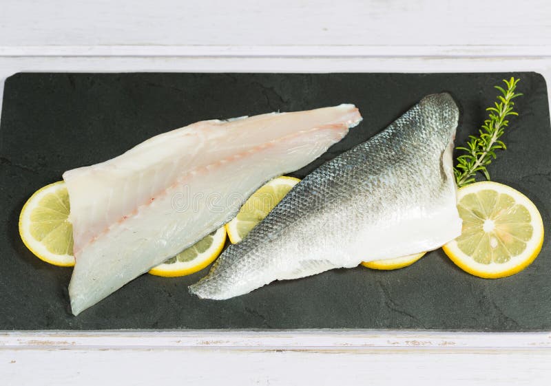 Sea bass fillets stock photo. Image of fillet, lemon - 48167176