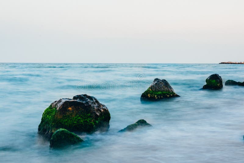 Sea beach with big rocks stock image. Image of east - 176536069