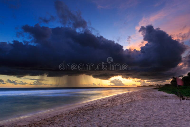Sea and Beach with Dark Rain Clouds at Sunset Stock Image - Image of ...