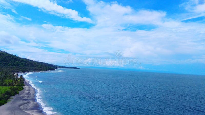 Sea,beach,land at lombok stock image. Image of cove - 264197553
