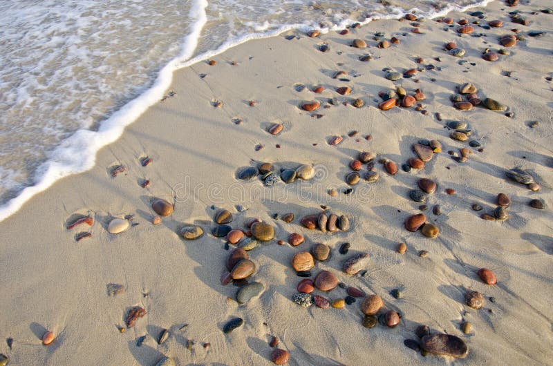 Sea Beach Sand and Wet Stones Stock Photo - Image of peace, beautiful ...