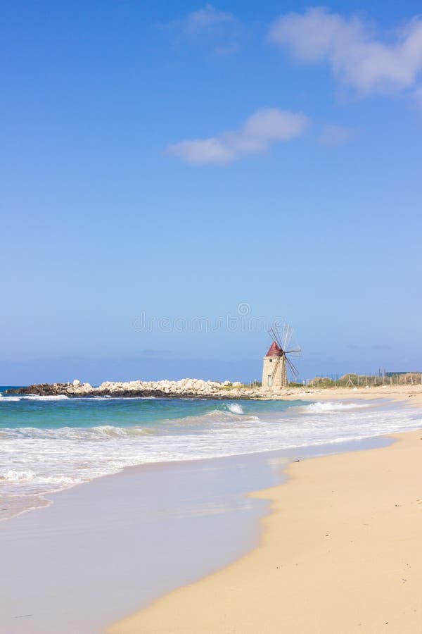 Sea beach windmill stock photo. Image of vertical, sandy - 52426902