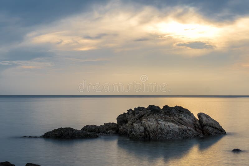Sea and Blue Flow Cloud Sky with Rock in Calm Sea Stock Photo - Image ...