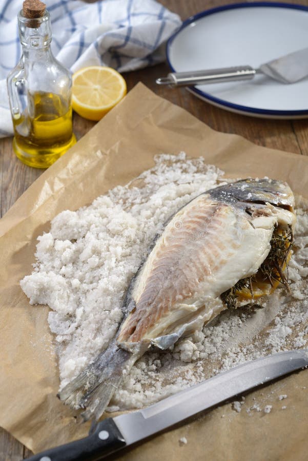 Sea bream baked in salt stock photo. Image of meal, gilt - 41206142