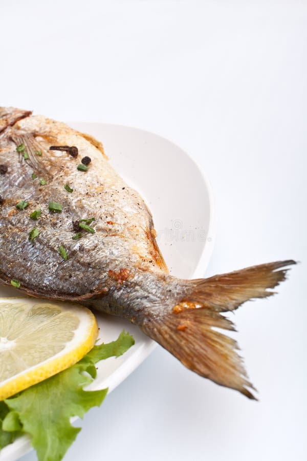 Sea Bream fish with Lemon stock image. Image of baked - 39153789