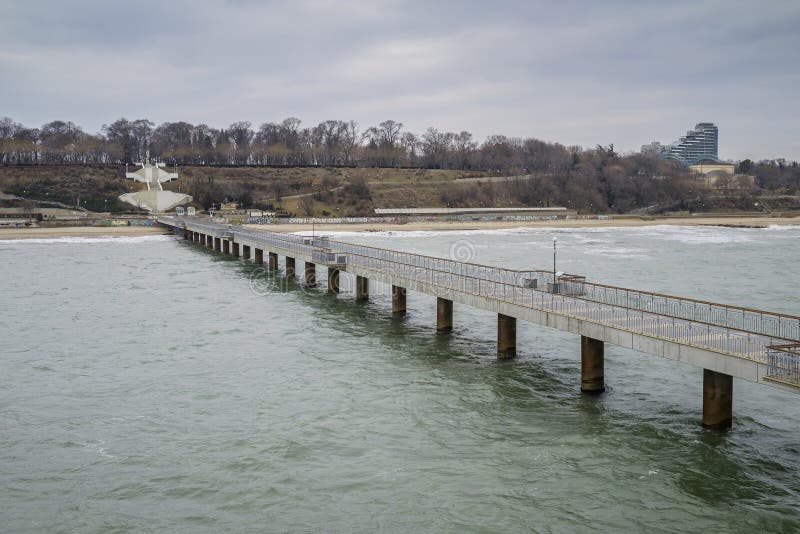 Bridge in the beach stock photo. Image of sunset, clouds - 82319104