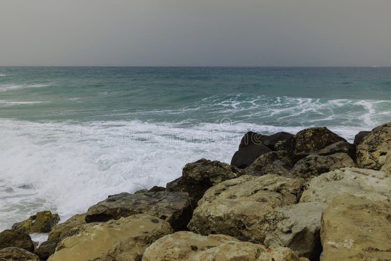 The sea in a cliff storm stock image. Image of rocks - 113097883