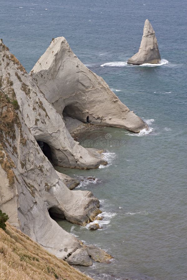 Sea cliffs and caves stock photo. Image of cliff, cliffs - 462322