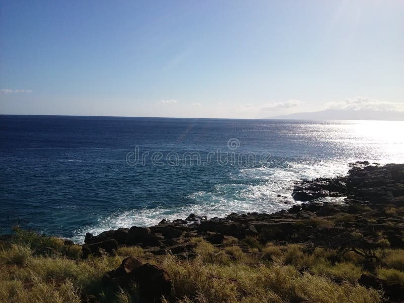 Sea cliffs of maui stock image. Image of wave, tower - 229520221