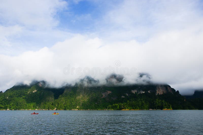 Sea Cloud Mountain View Paddle Boat Explorer Stock Image - Image of ...