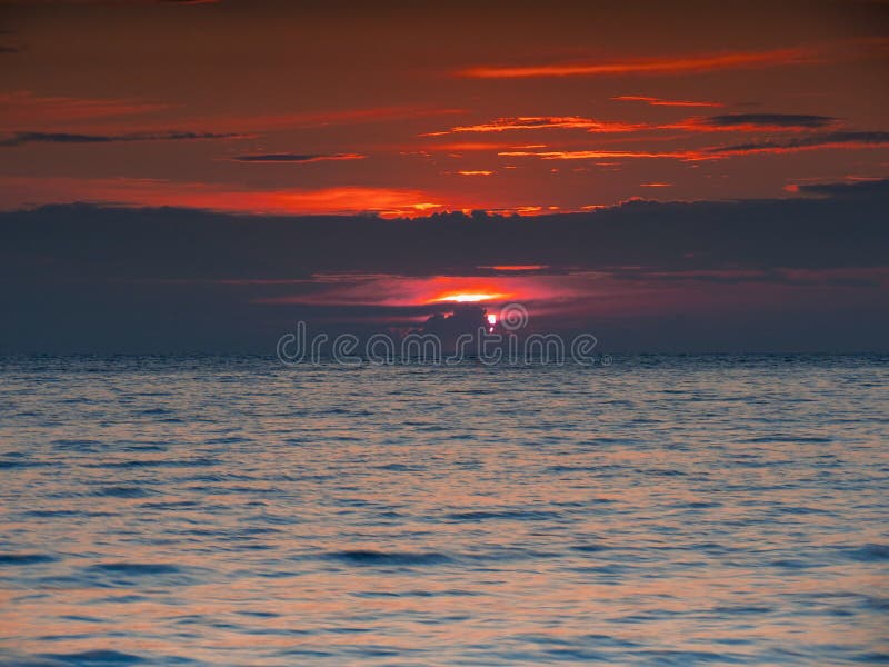 Sea and Cloudy Sky Sunlight almost Dark Night Stock Photo - Image of ...