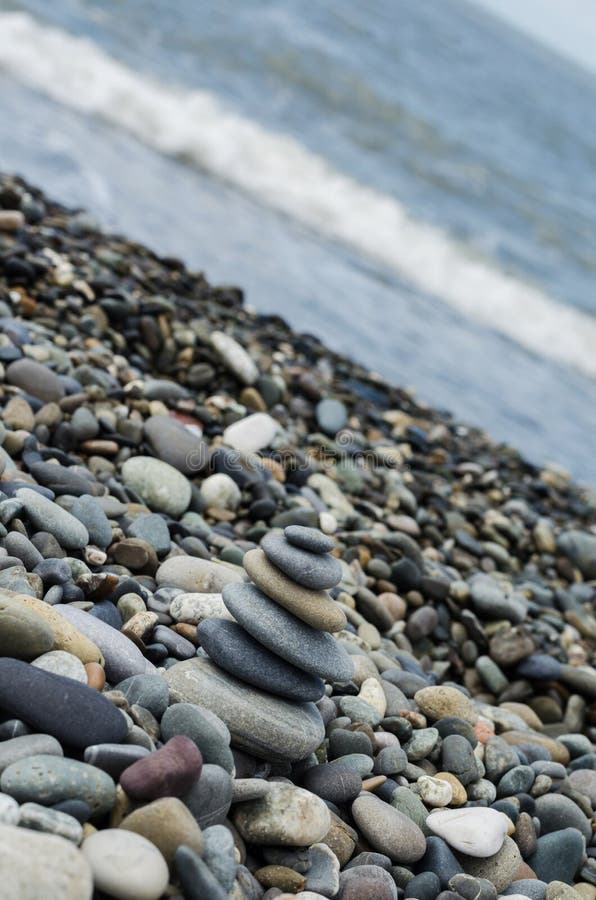 Sea coast with pebbles stock photo. Image of background - 147907628