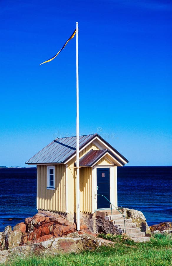 Sea Cottage stock photo. Image of blue, flaggstaff, marine - 6824788