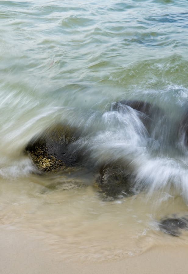 Sea Crashing on Rocks stock photo. Image of slippery, eddies - 8030626