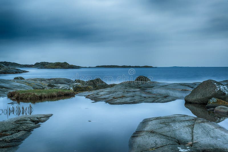 Rain over a dark sea stock photo. Image of clouded, nature - 208914864