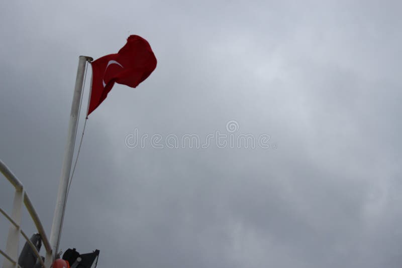 Sea flag and seagull stock image. Image of hellespont - 112016901