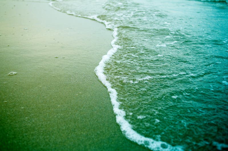 Foam on the beach stock image. Image of orizon, coast - 108035927