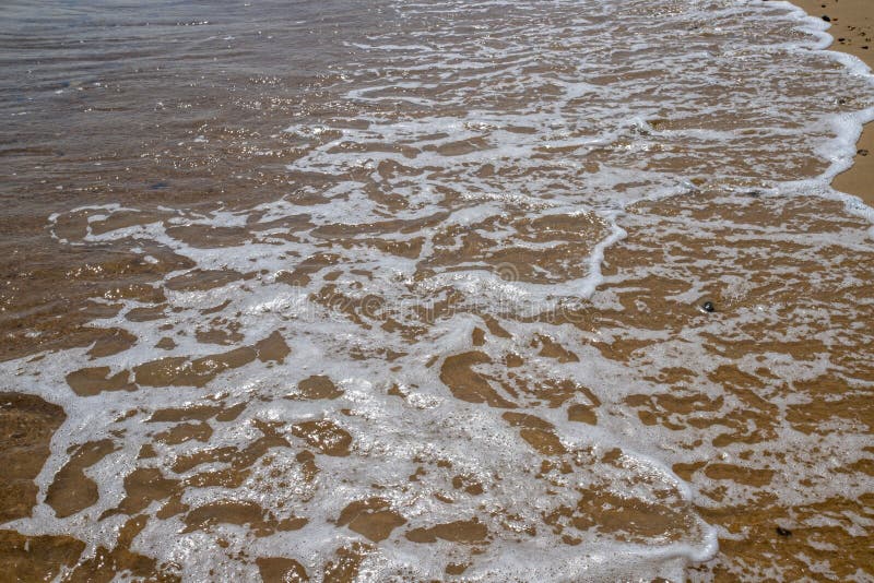 Sea foam water beach stock photo. Image of coastline - 156927308