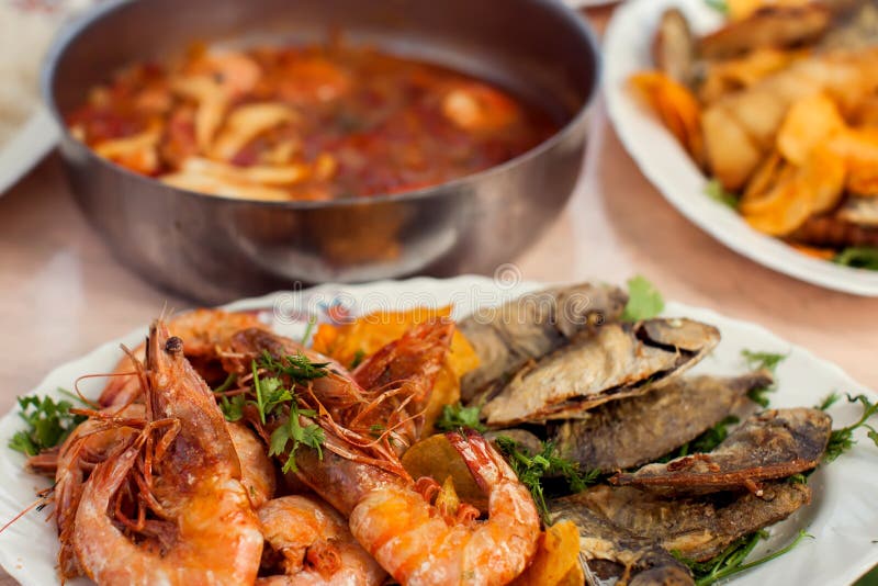 Sea Food Dishes in Plates on the Table Stock Photo - Image of cuisine ...