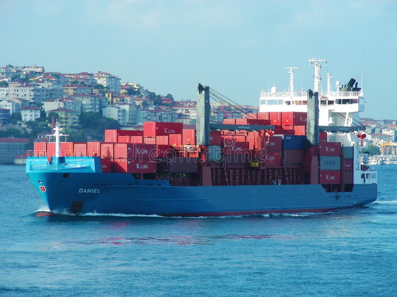 Sea Freight Transportation Concept. a Large Cargo Ship Transports Red ...