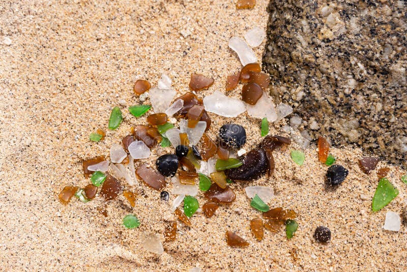 Sea glass on sand stock photo. Image of fort, weathered - 170079912