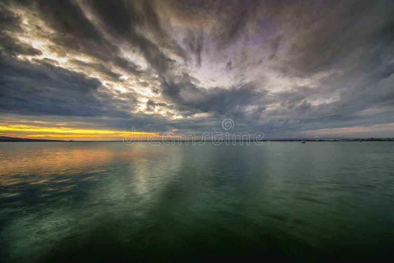 Sea Gleaming Under the Cloudy Sky - Great for Wallpapers Stock Image ...