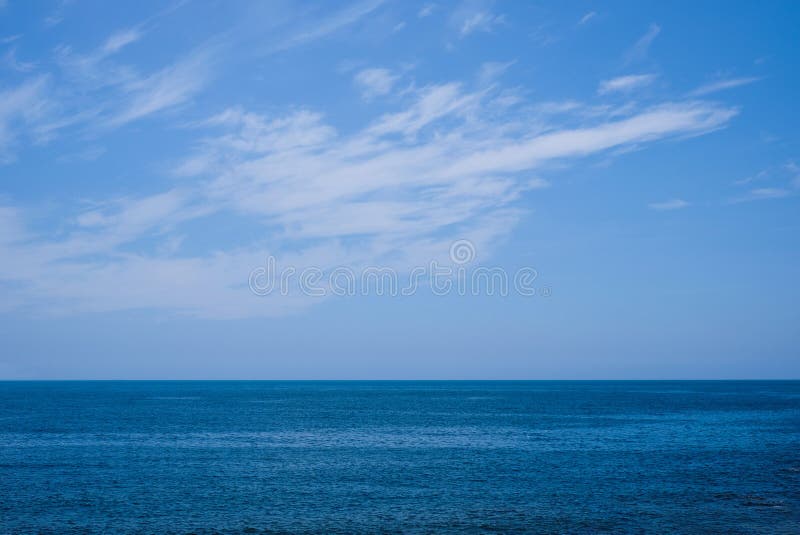 Sea with Sea Horizon and Bright Blue Sky with Clouds. Stock Image ...