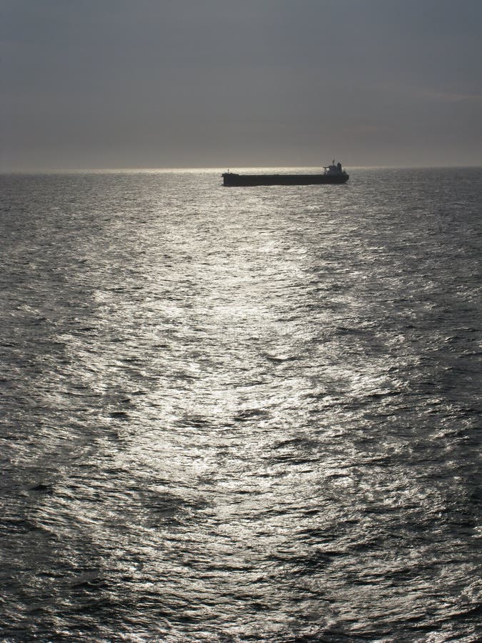 Sea and Horizon with Container Ship in Distance B Stock Photo - Image ...