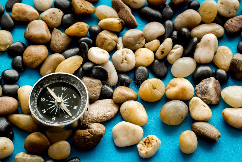 Sea Journey, Travelling and Vacation Concept. Compass on Rocks and Blue ...
