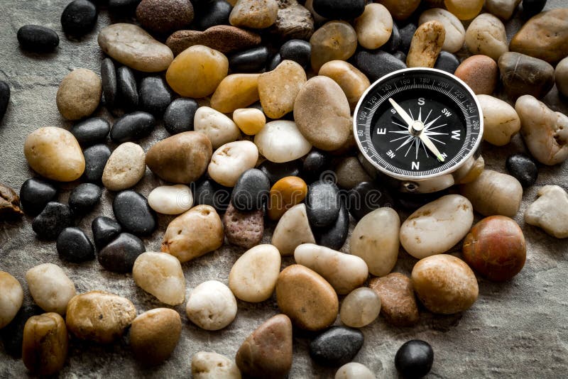Sea Journey, Travelling and Vacation Concept. Compass on Rocks and Grey ...