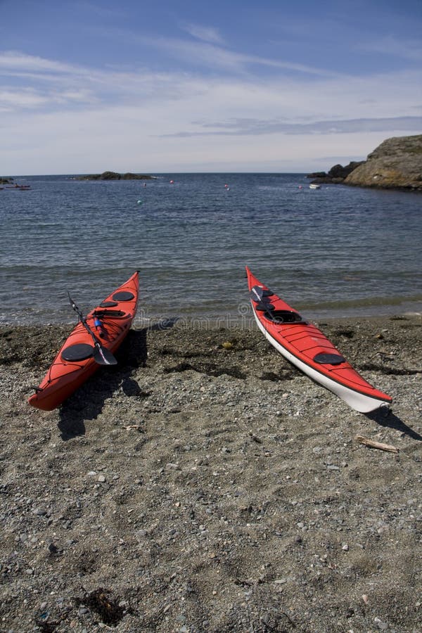 Sea Kayaks stock photo. Image of kayaks, coastline, beached - 9137628