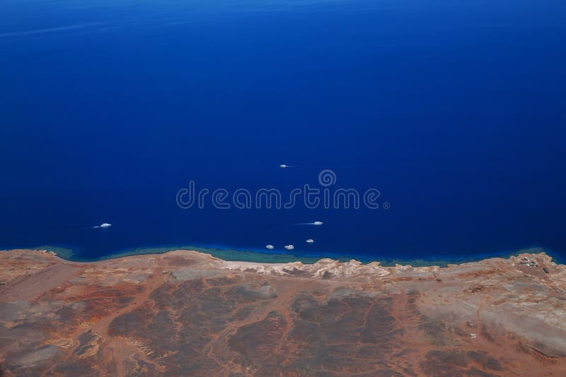 Sea and land from above stock photo. Image of island - 225735142